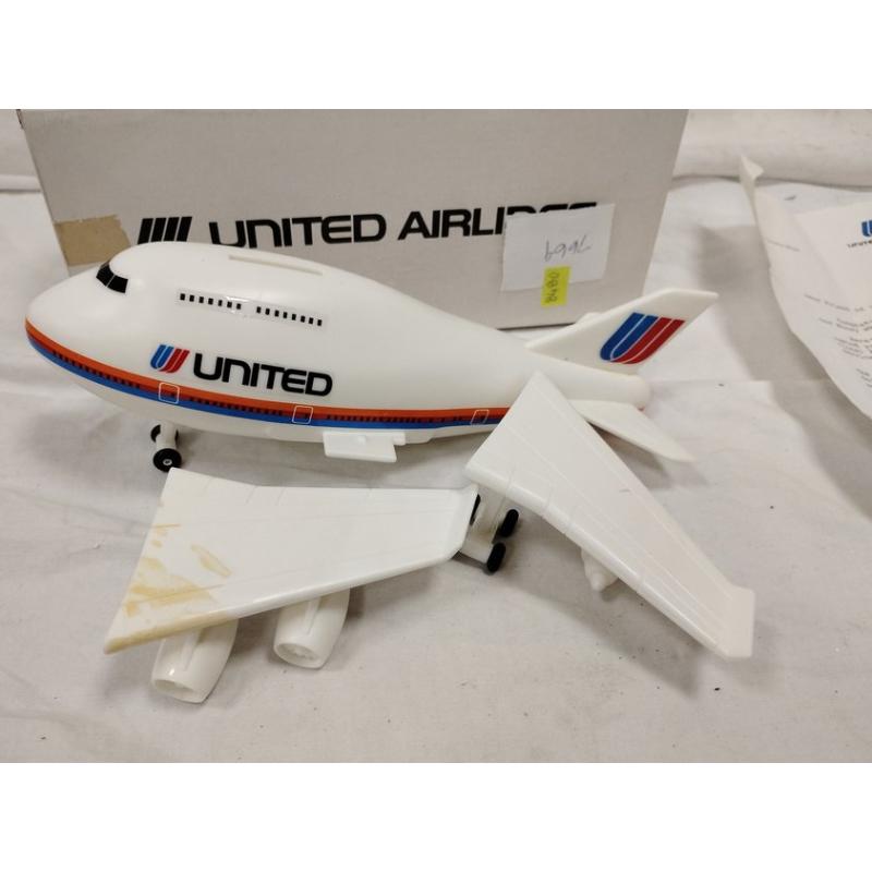 UNITED AIRLINES PLASTIC AIRPLANE BANK WITH BOX